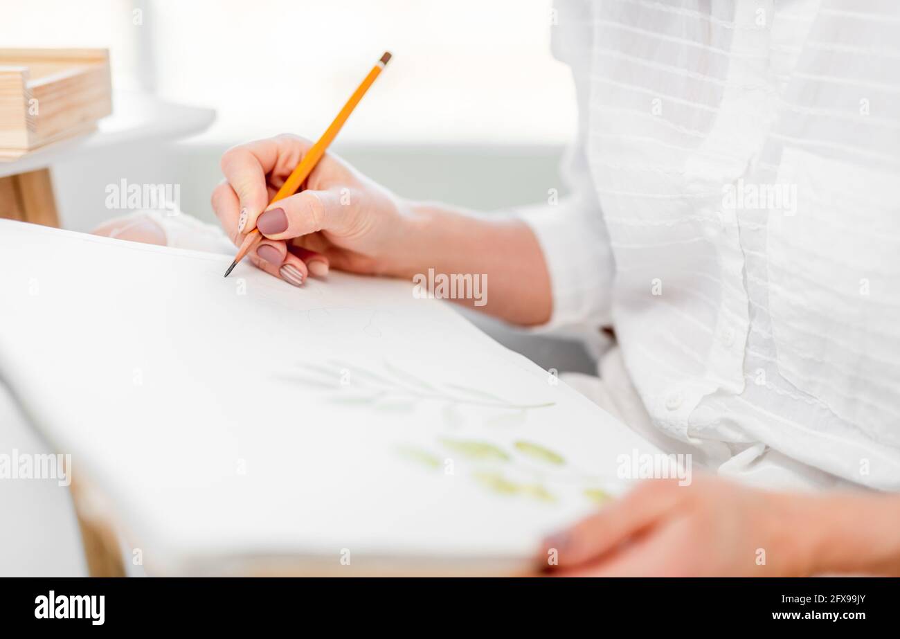 Sketching with pencil on white paper Stock Photo - Alamy