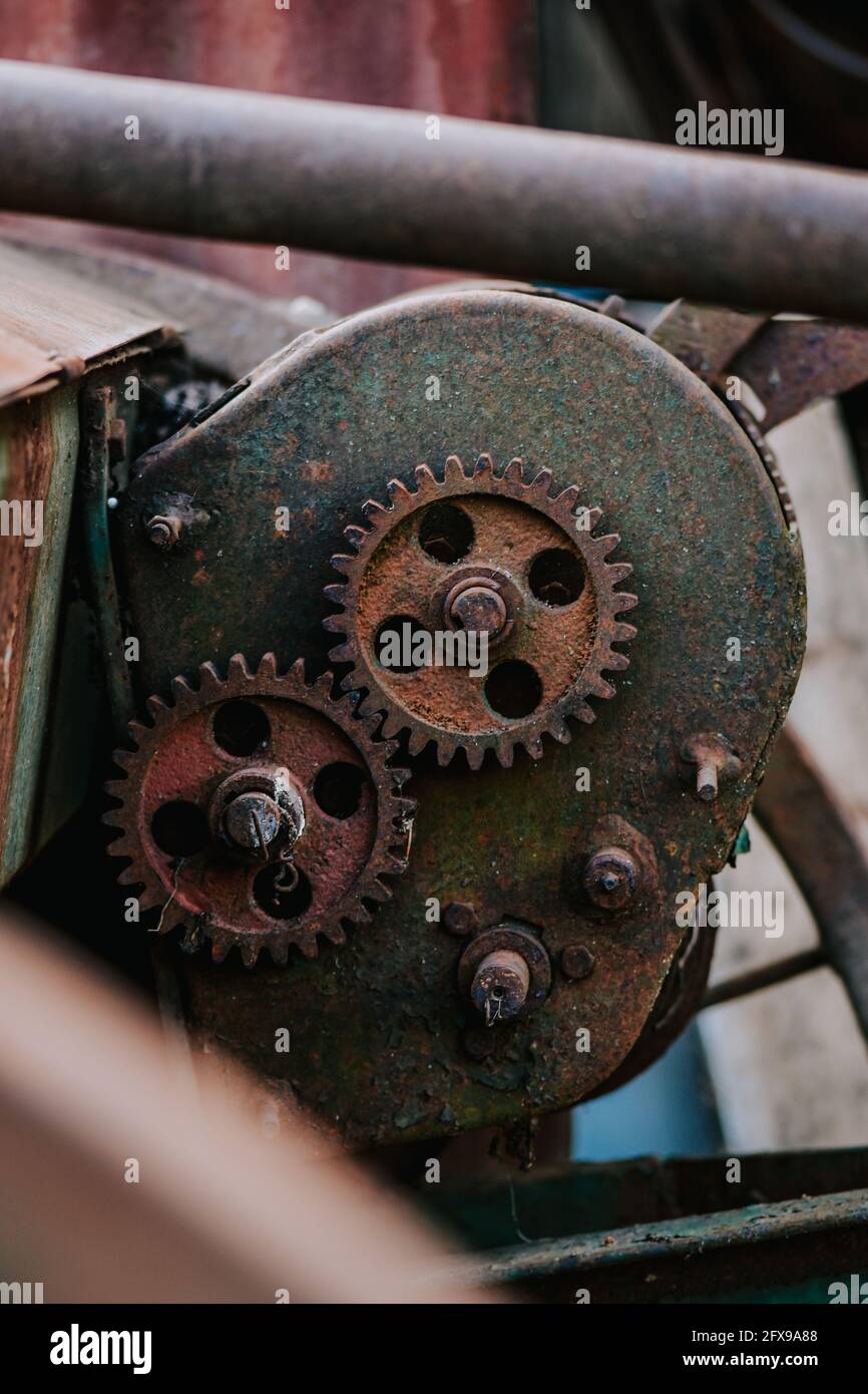 Vertical shot rusty gears hi-res stock photography and images - Alamy