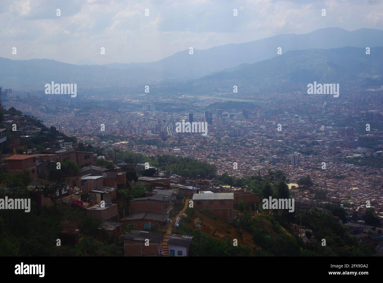View of the city from the cable car ride to Parque Arvi, Medellin ...
