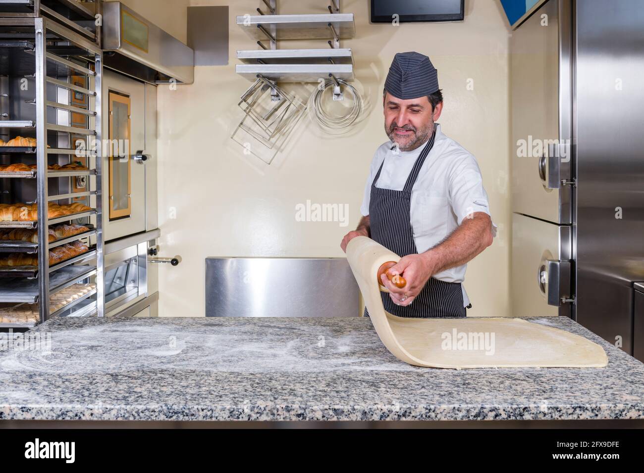 Stages of preparation, pastry chef prepares jam croissant in pastry ...