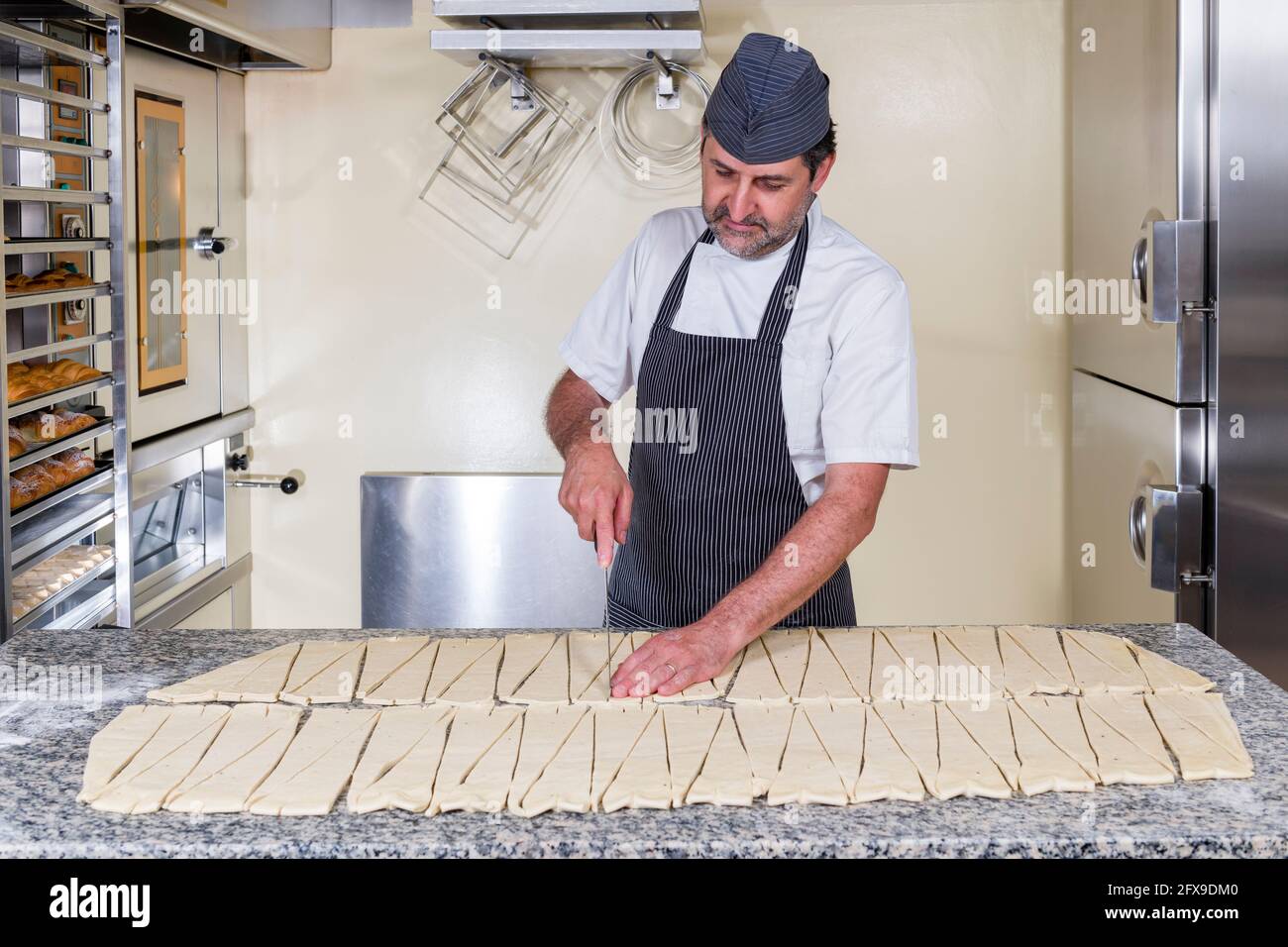 Stages of preparation, pastry chef prepares jam croissant in pastry ...