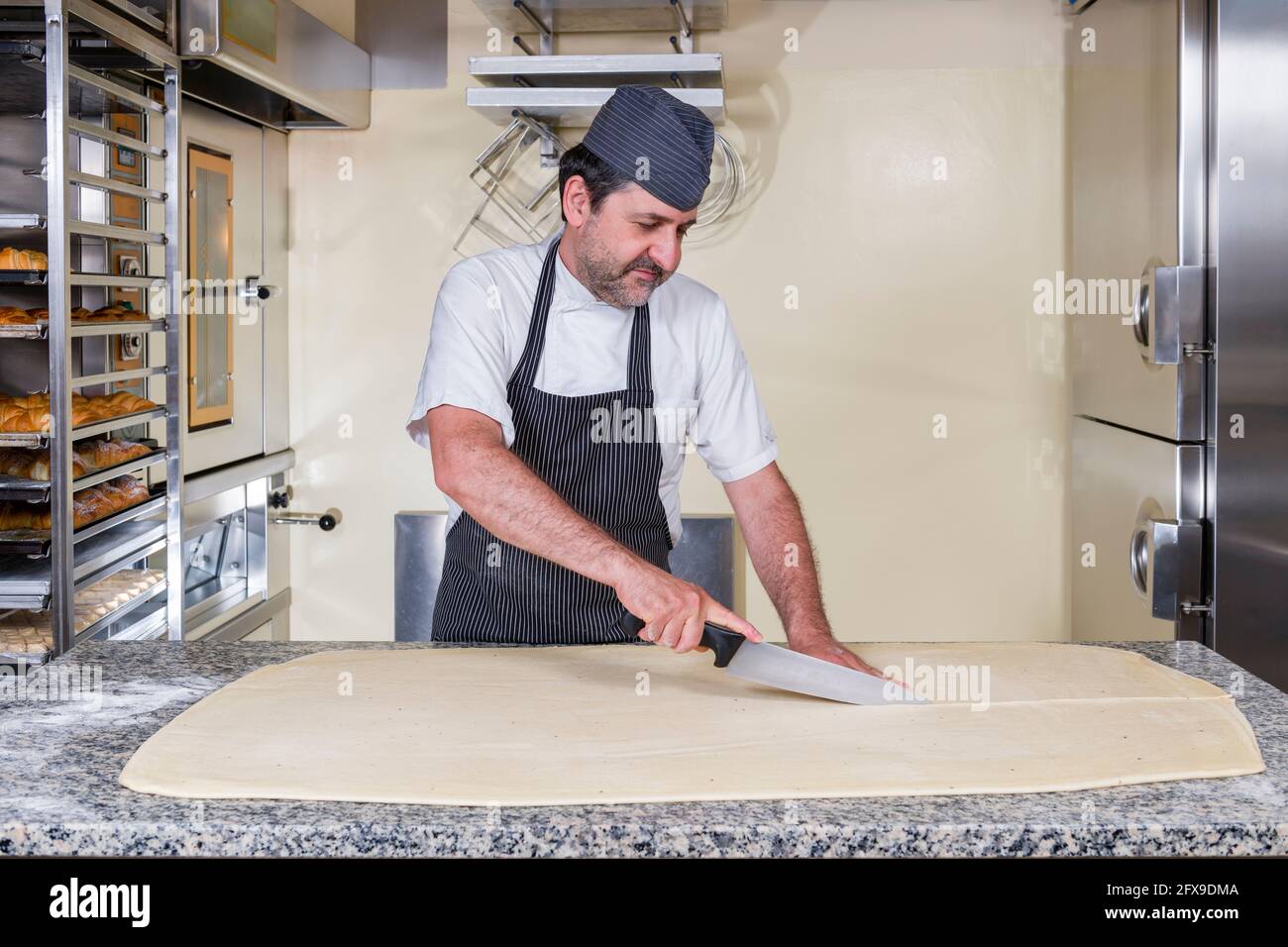 Stages of preparation, pastry chef prepares jam croissant in pastry ...