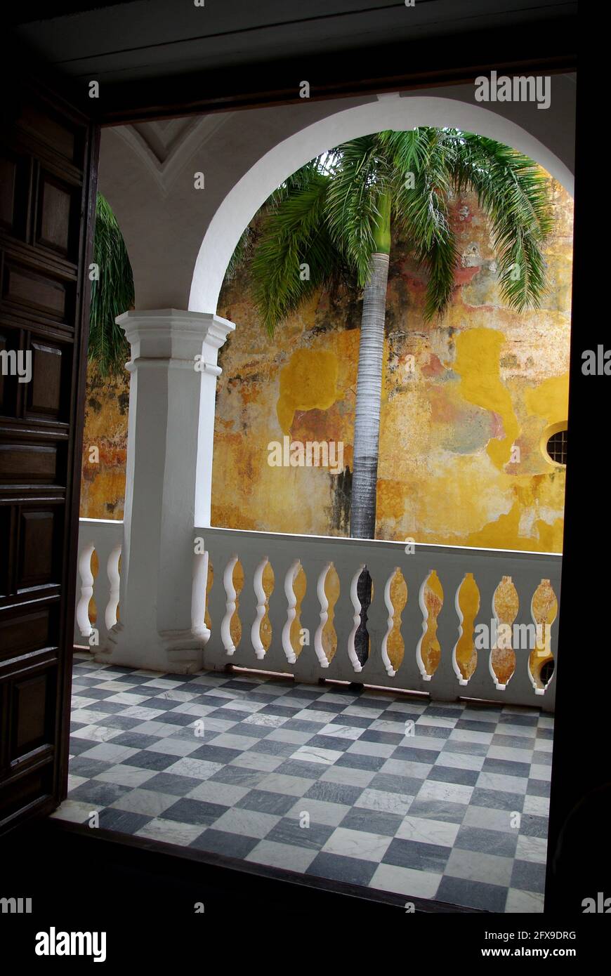Archway and balustrade leading to inner courtyard at Museum in Palace ...