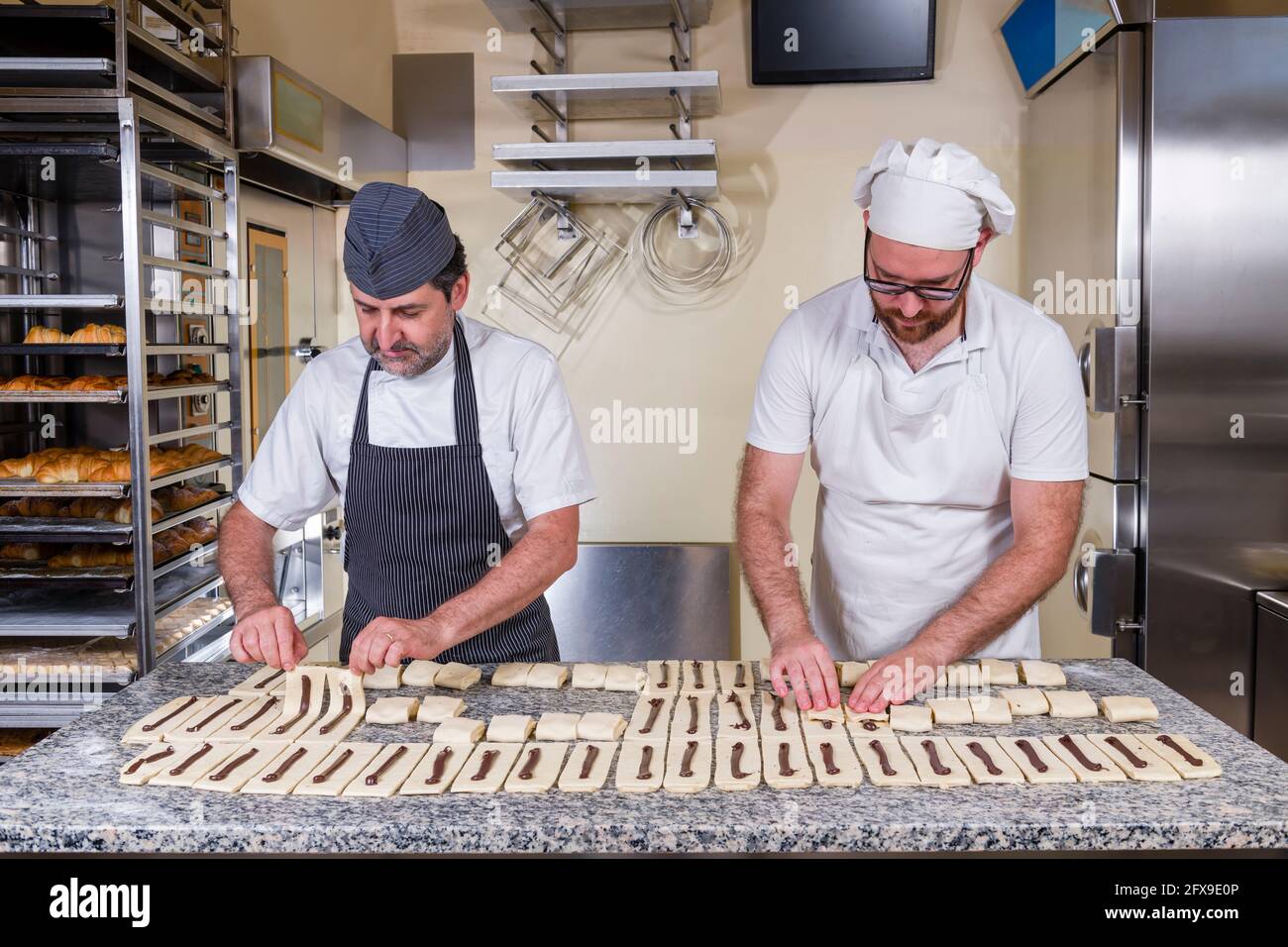 Stages of preparation, pastry chef prepares chocolate brioche in pastry ...