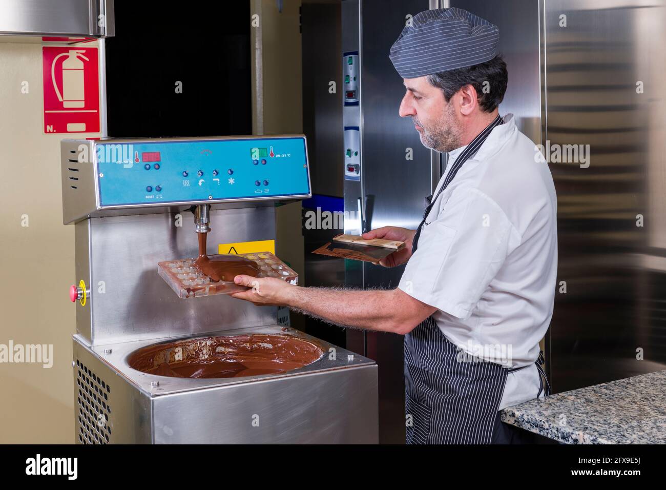 stages of preparation of dark chocolate in pastry Stock Photo - Alamy