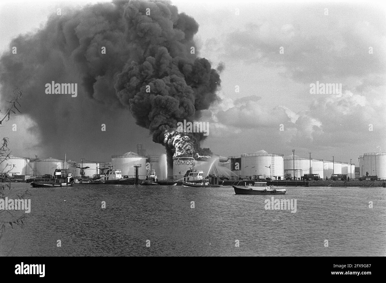 Burning gasoline storage tank amidst Black and White Stock Photos ...