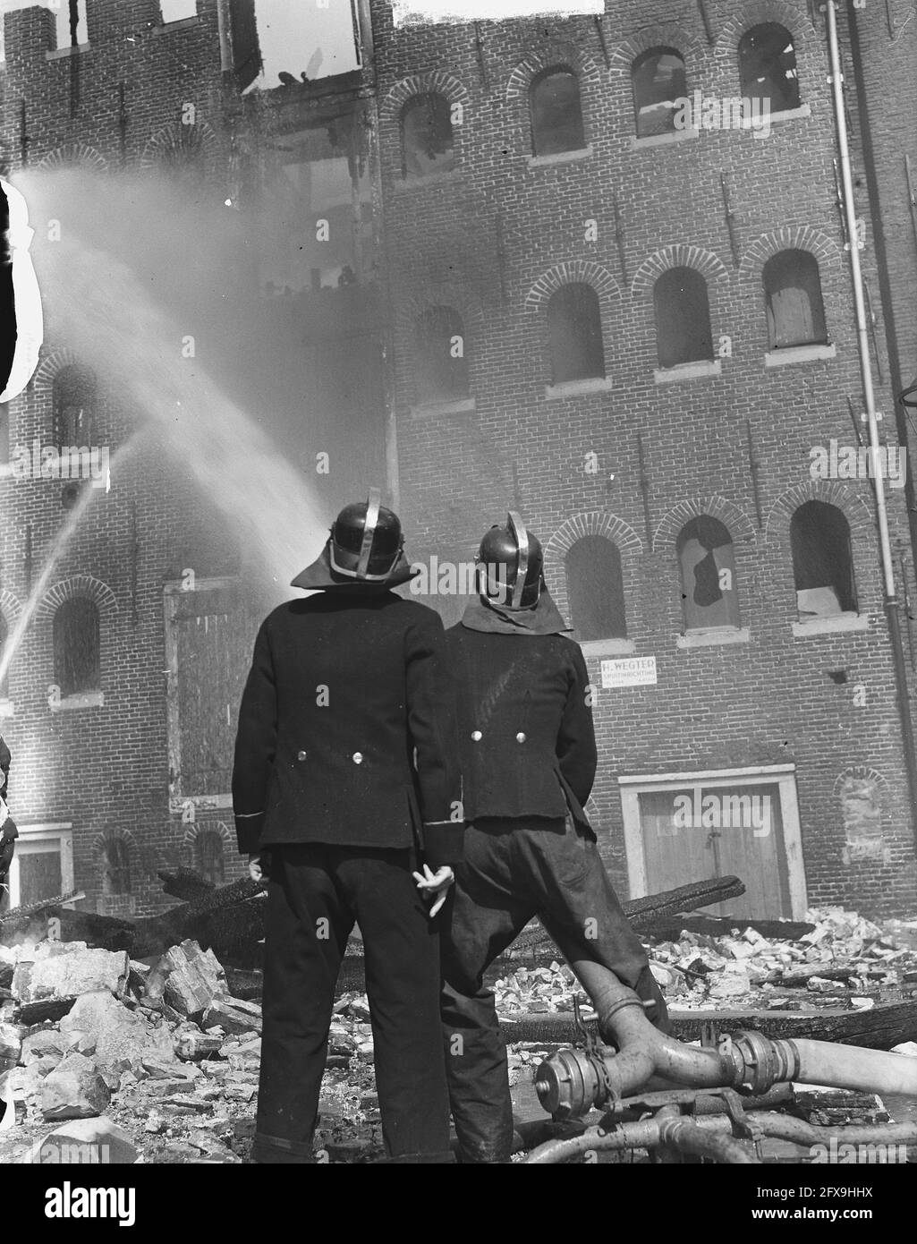 Fire in warehouses on Prinseneiland 75 in Amsterdam. Fire department in ...