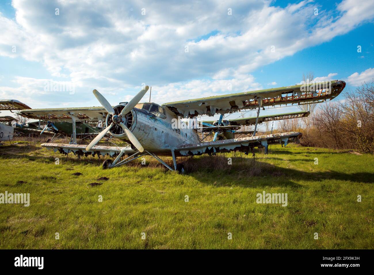 Old Soviet military aircraft standing at the airfield. Rusty used ...