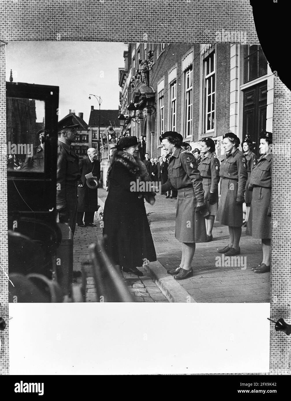 Breda. Queen Wilhelmina is greeted by an officer of the Women's ...