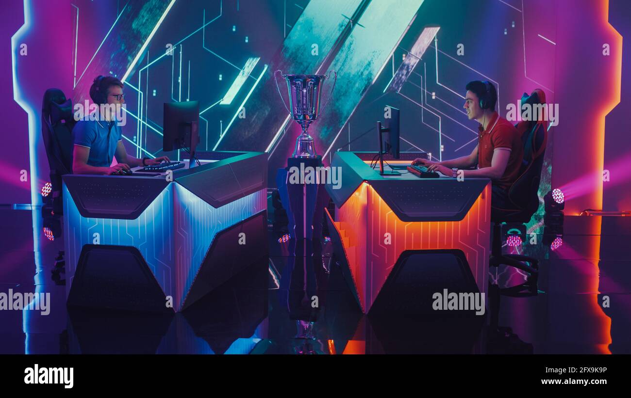 Two Esport Gamers Competition in a Video Game on a Championship Arena ...