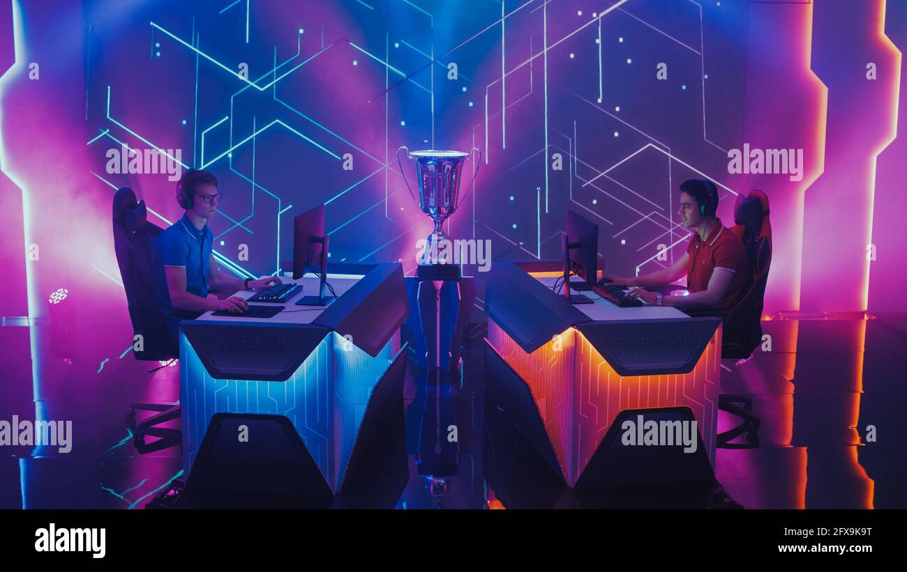 Two Esport Gamers Competition in a Video Game on a Championship Arena ...