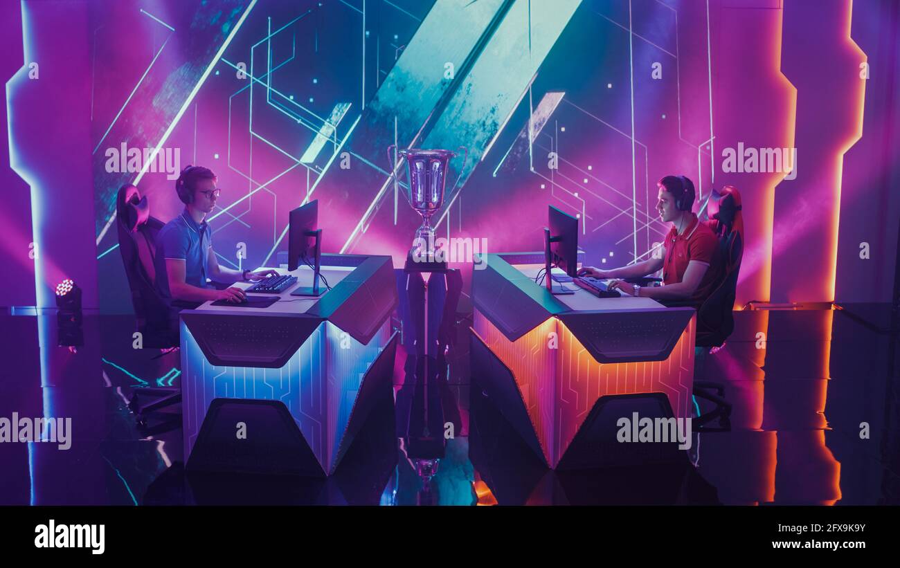 Two Esport Gamers Competition in a Video Game on a Championship Arena ...