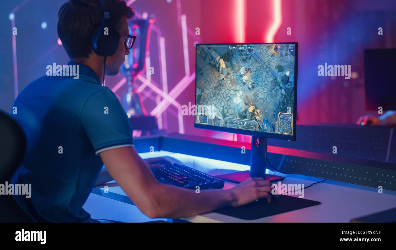 Professional eSports Gamer Plays RPG MOBA Mock-up Video Game with Super ...