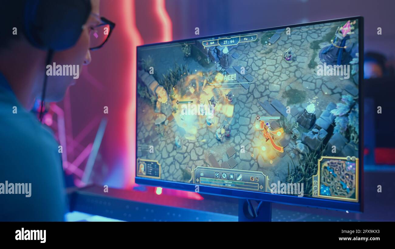 Professional eSports Gamer Plays RPG MOBA Mock-up Video Game with Super ...