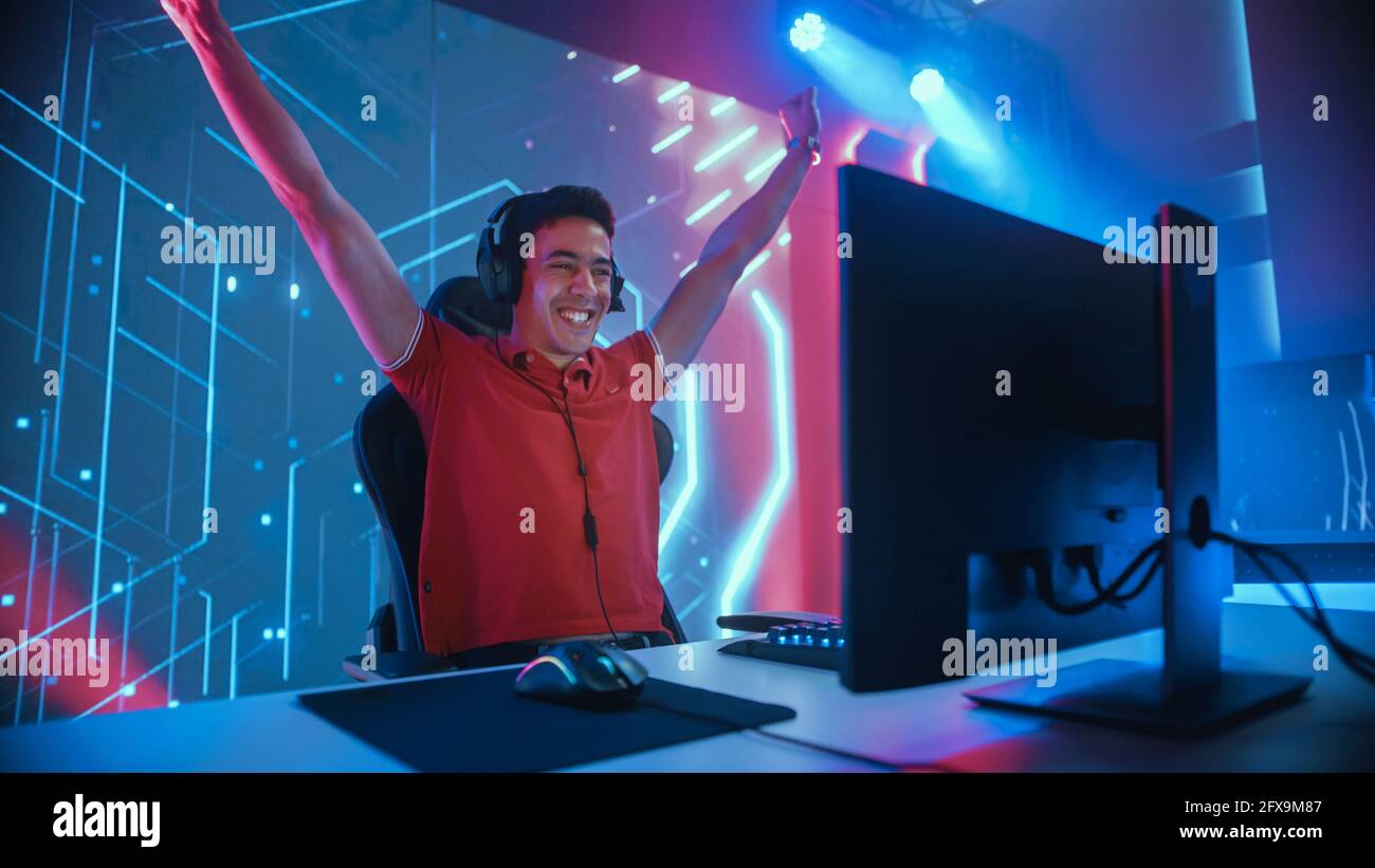 Professional eSports Gamer Playing in Computer Video Games, Happily and ...