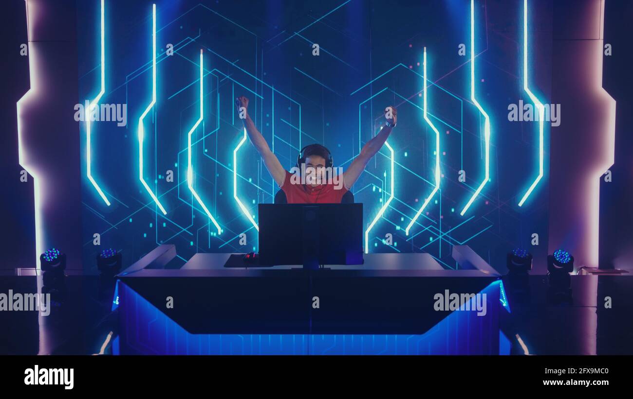 Professional eSports Gamer Playing in Computer Video Games, Happily and ...