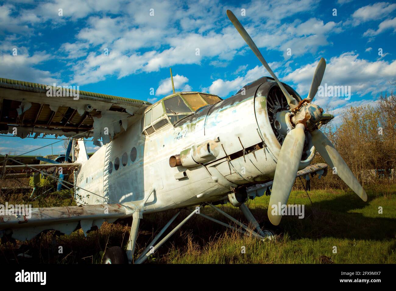 Old Soviet military aircraft standing at the airfield. Rusty used ...