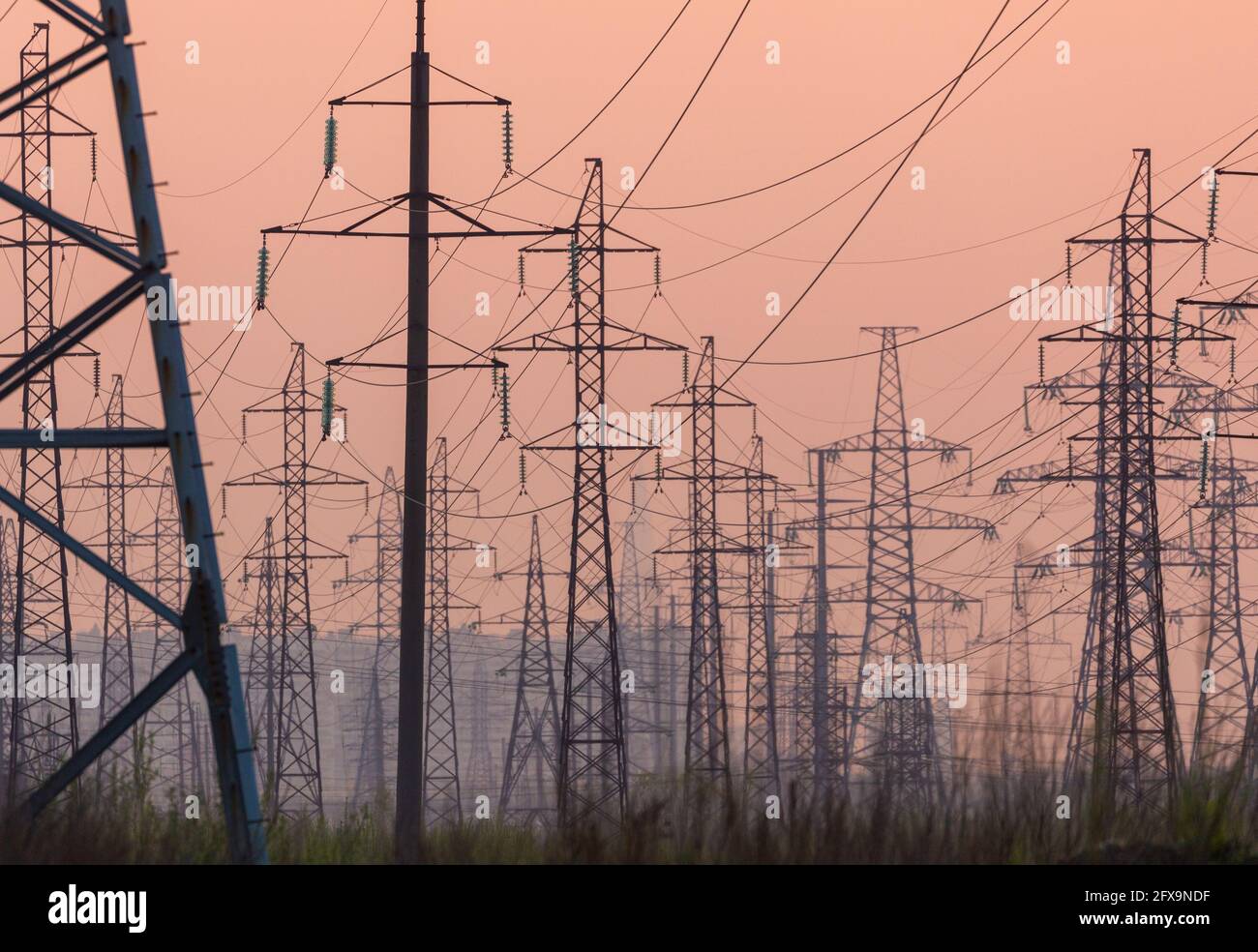 Closeup shot of high voltage electricity transmission towers after ...