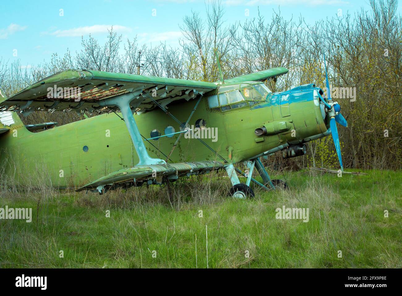Old Soviet military aircraft standing at the airfield. Rusty used ...