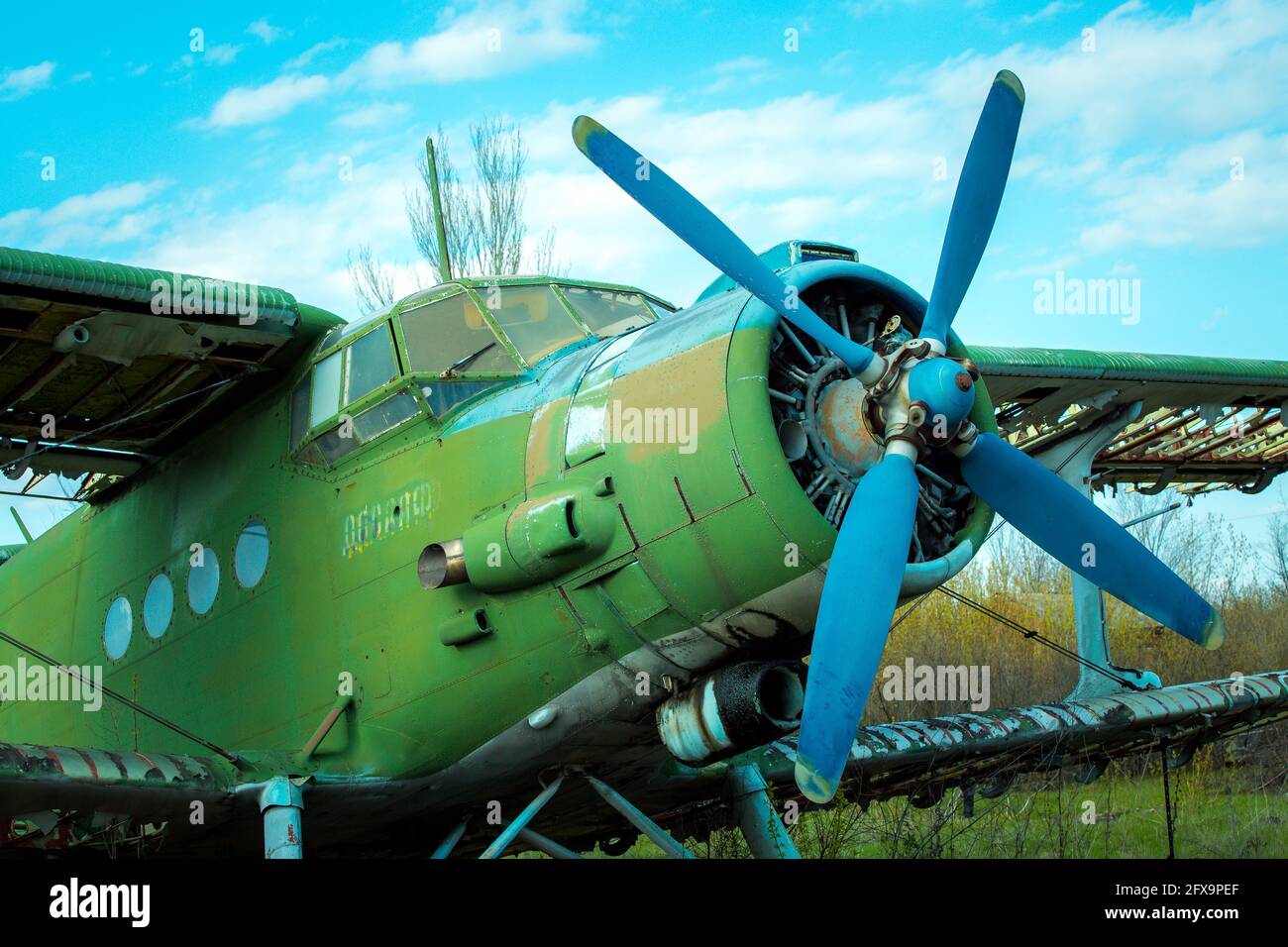 Old Soviet military aircraft standing at the airfield. Rusty used ...