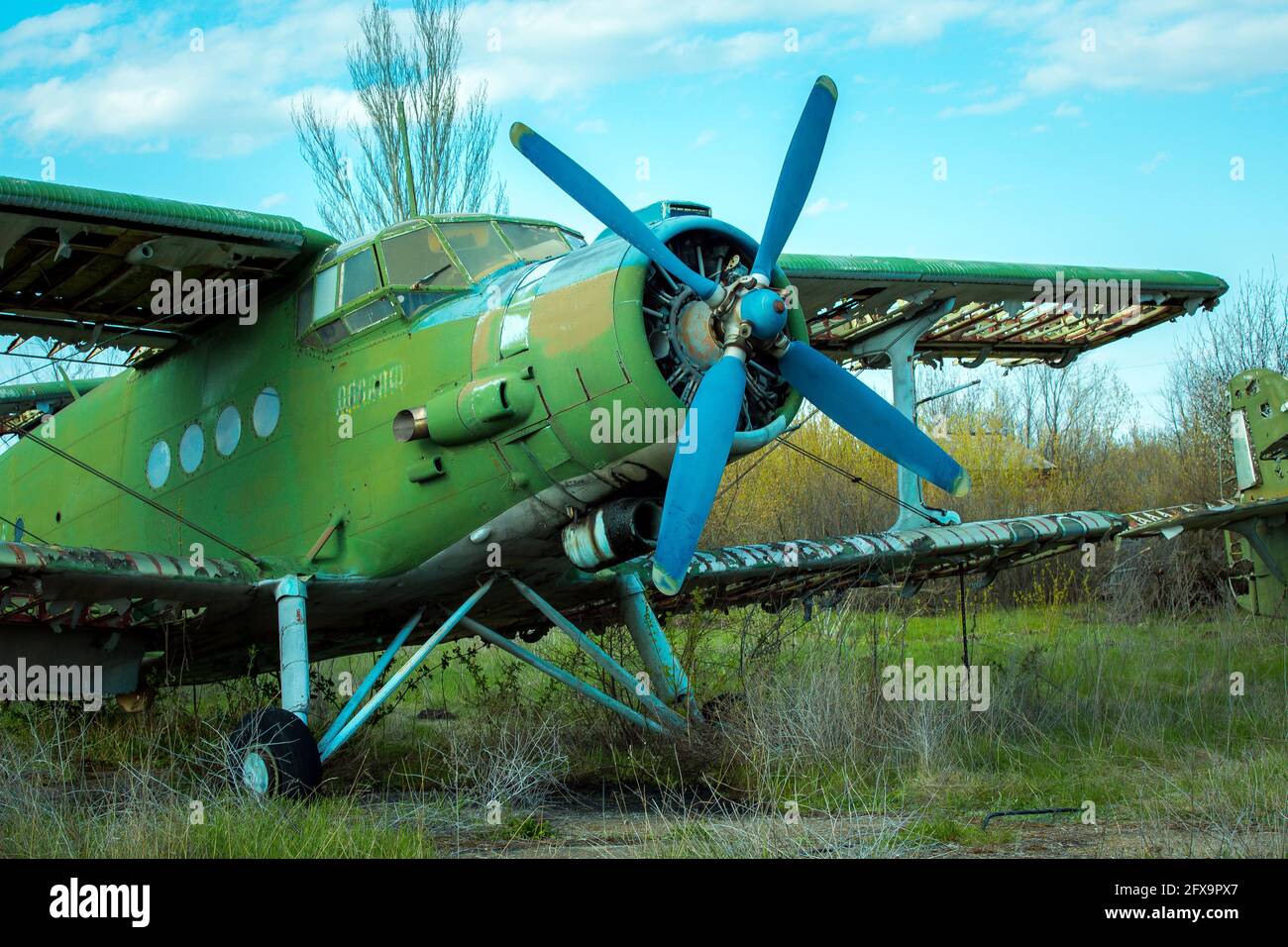 Old Soviet military aircraft standing at the airfield. Rusty used ...