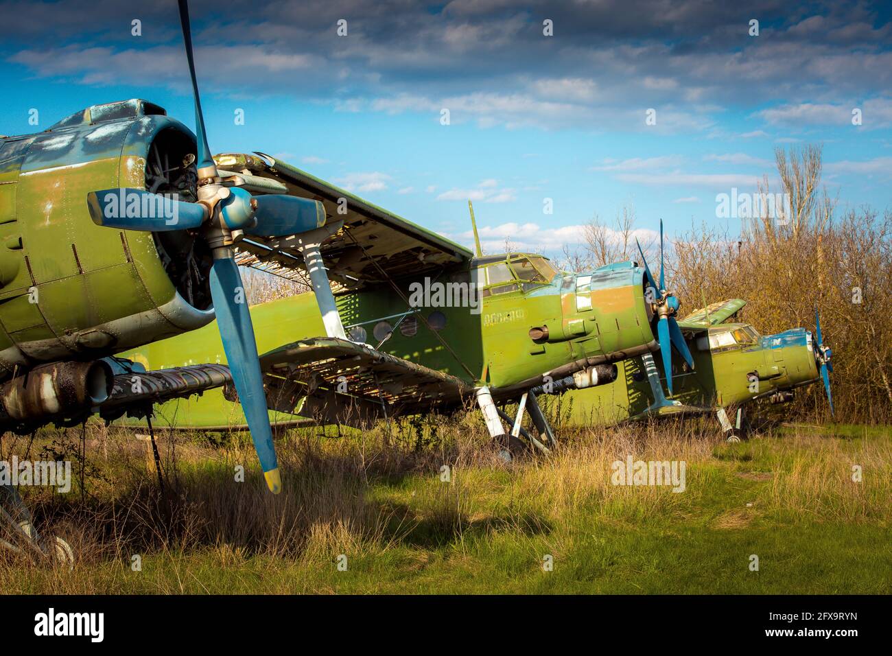 Old Soviet military aircraft standing at the airfield. Rusty used ...