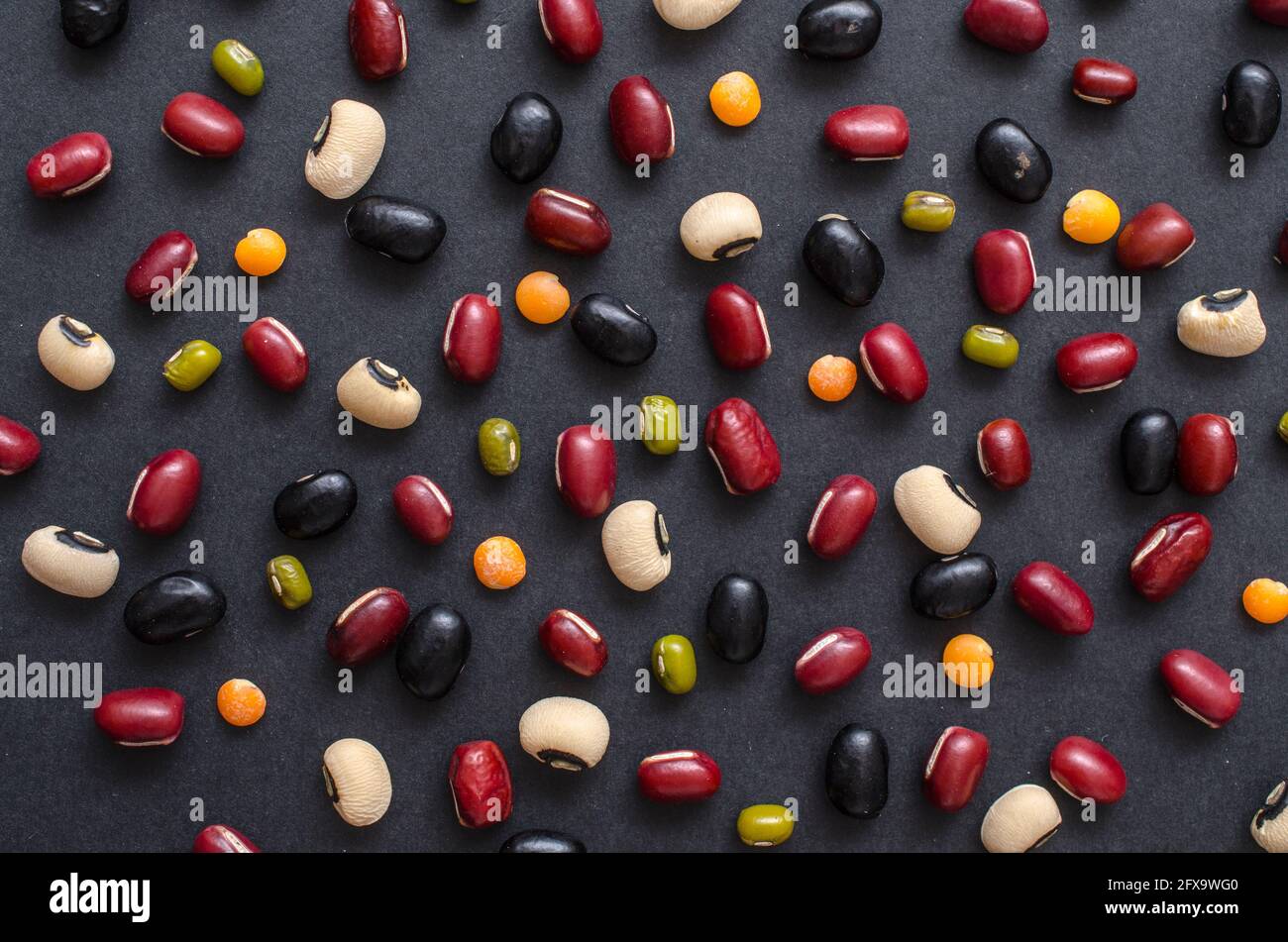 Different types of beans mixed background Stock Photo - Alamy