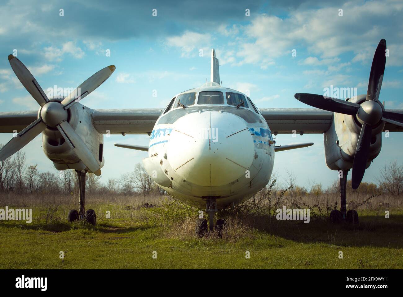 Old Soviet military aircraft standing at the airfield. Rusty used ...