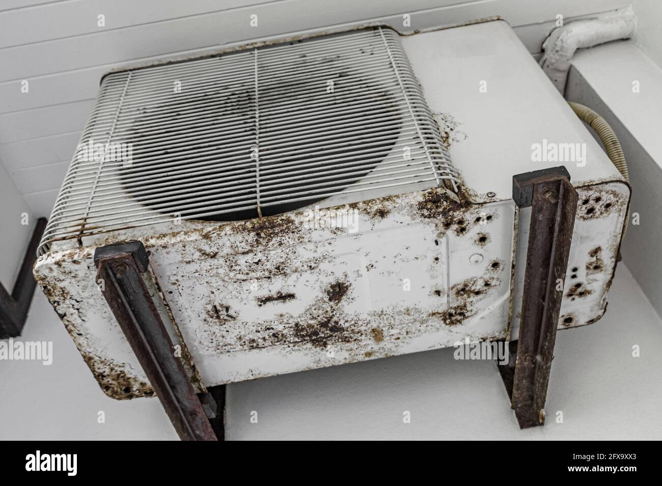 Dirty old rusted air conditioner at hotel room in Nai Thon Naithon ...
