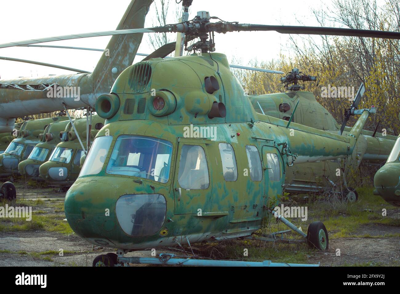 Old Soviet military aircraft standing at the airfield. Rusty used ...