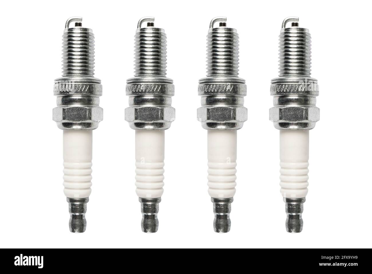 Macro shot of spark plug isolated on white background. A spark plug for ...