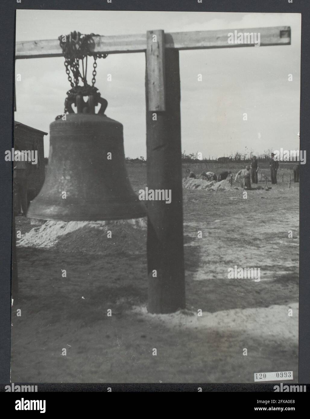 Church bell waiting to be rebuilt from a tower destroyed during WWII ...