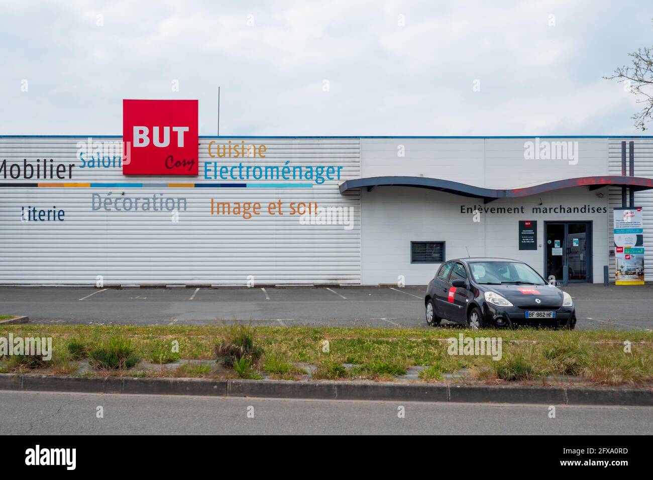 BUT Front Store Facade of Shop with Logo Signage in Fleche, France 20.5 ...