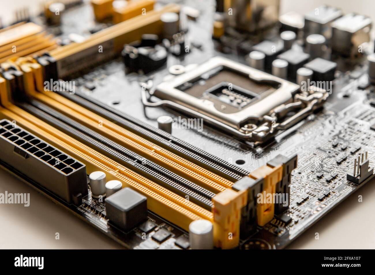 Part of the motherboard with a slot for placing RAM modules against the ...