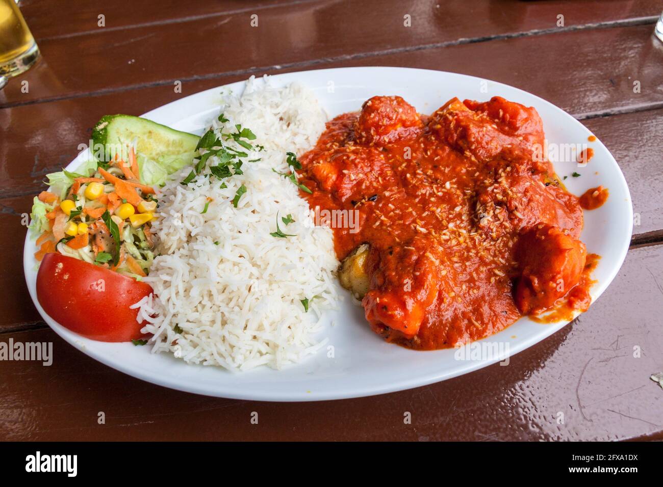 Indian cuisine - dish of Chicken vindaloo Stock Photo - Alamy