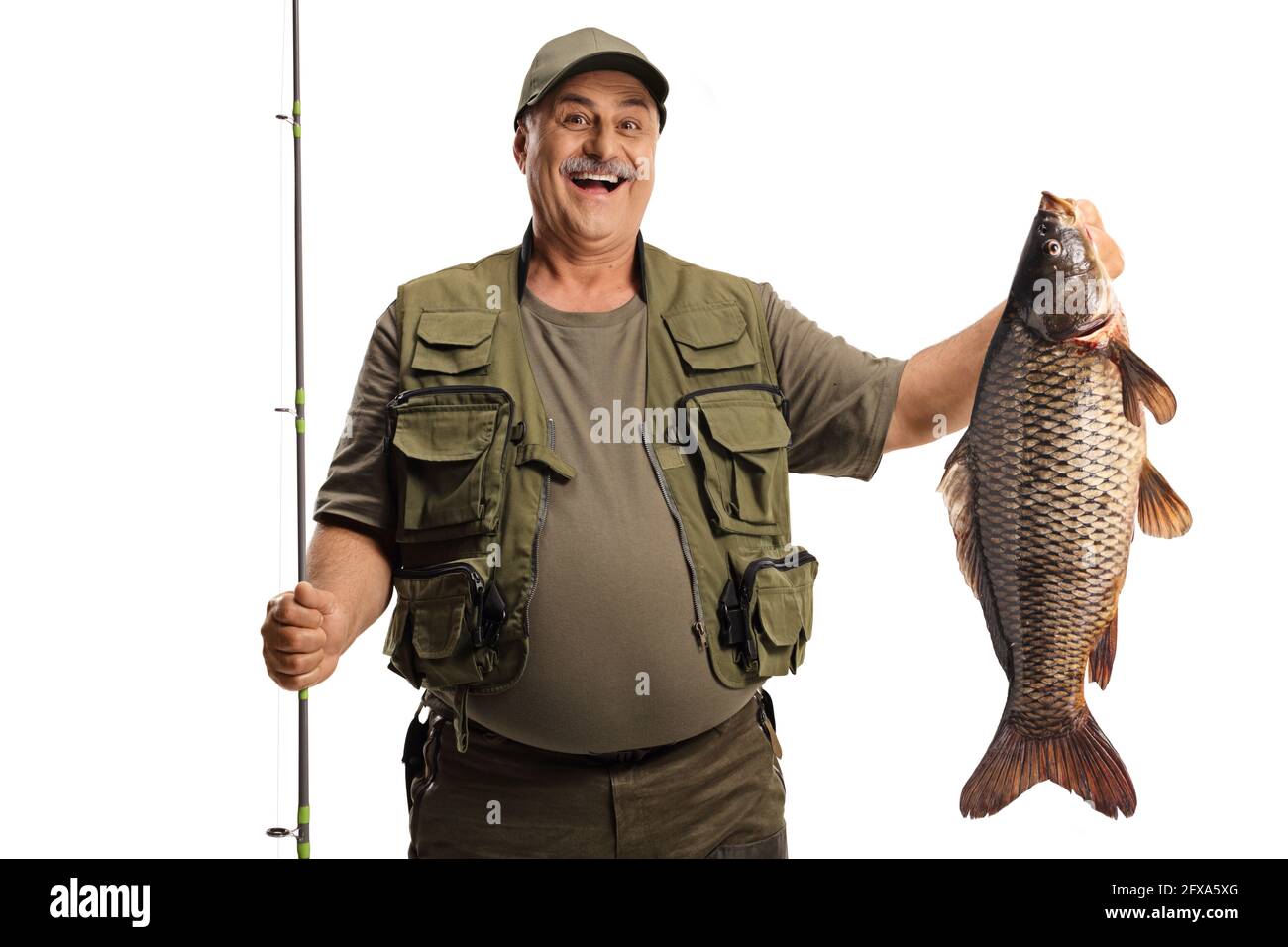 Happy fisherman holding a big carp fish and smiling isolated on white ...