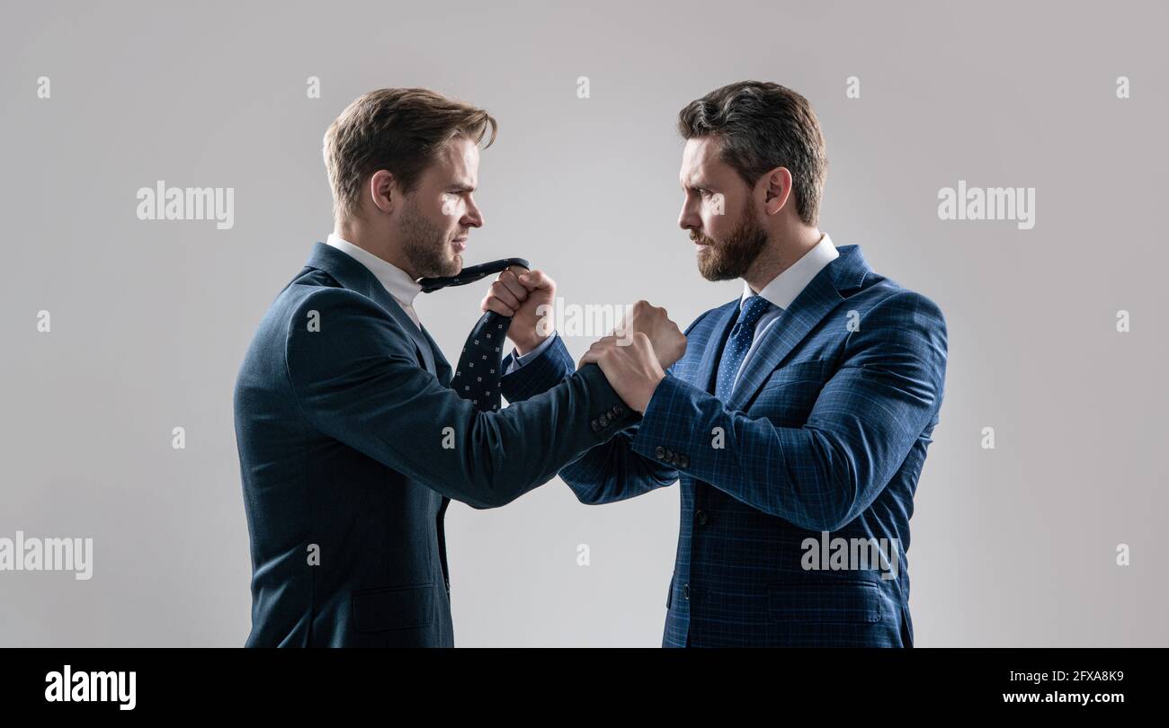 two angry businessmen fighting and arguing on businessmeeting have ...