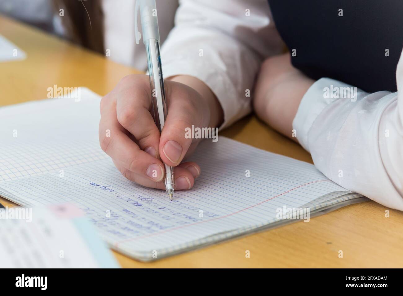 Completes a math problem hi-res stock photography and images - Alamy