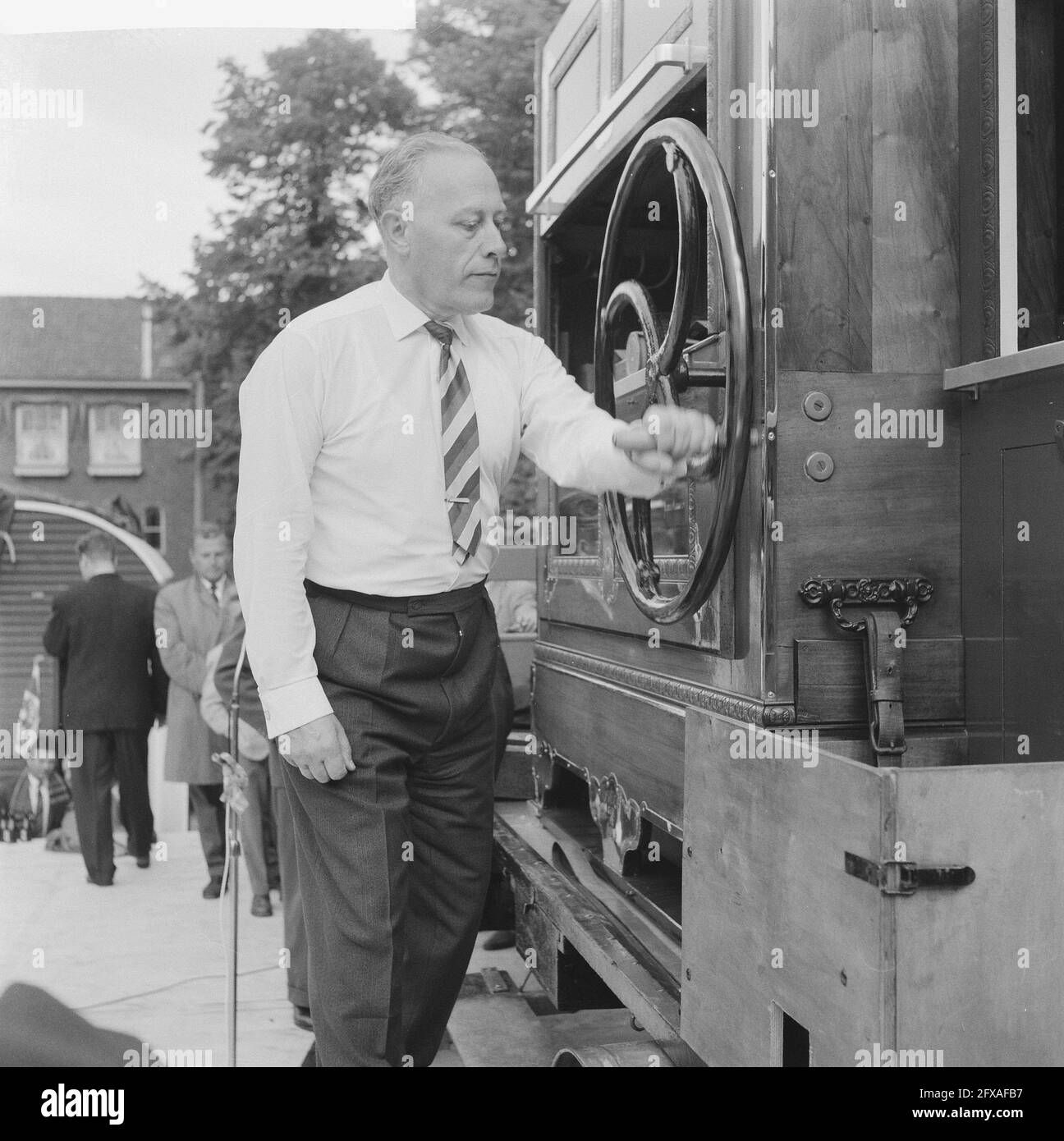 Fairground organ competition in Den Bosch . Man behind organ, August 17 ...