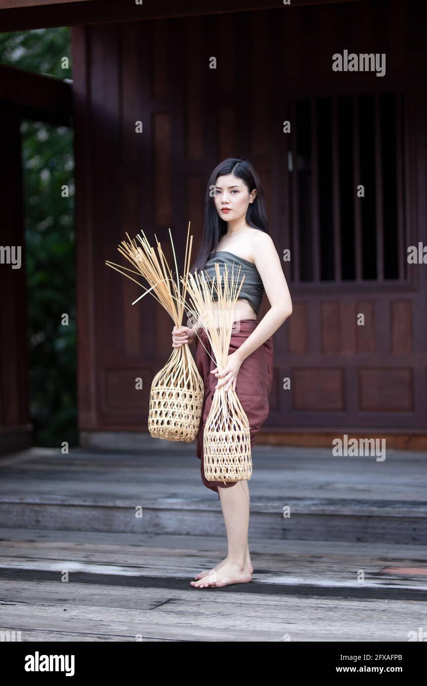 Portrait of Thai farmers wearing Thai traditional dress in rural of ...