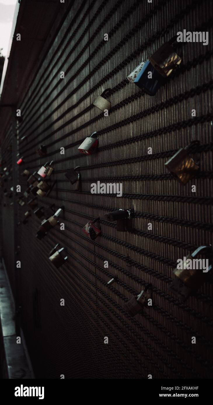 Old locks on the metal wall Stock Photo - Alamy