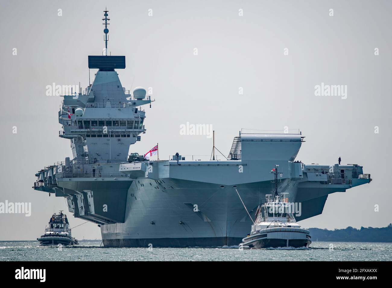 The Royal Navy aircraft carrier HMS Prince of Wales (R09) returning to ...