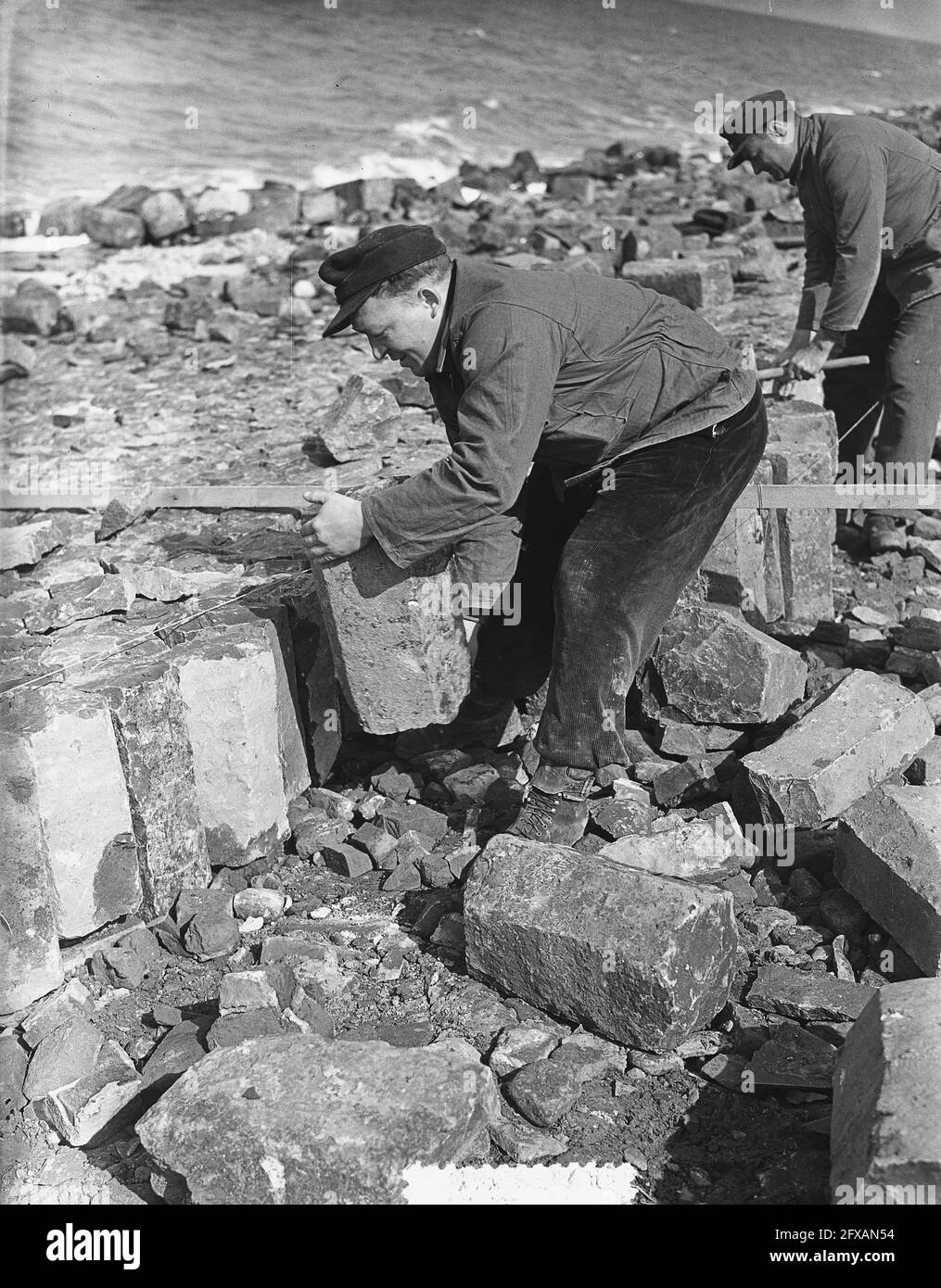 German brick setters working on Afsluitdijk, April 7, 1953 ...