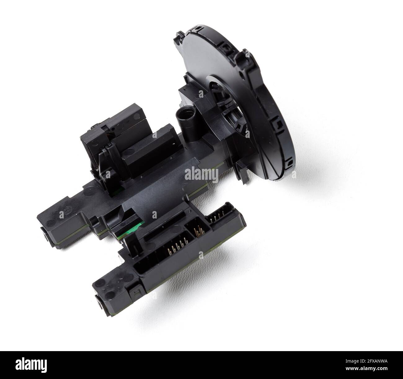 steering angle sensor disassembled on a white isolated background ...