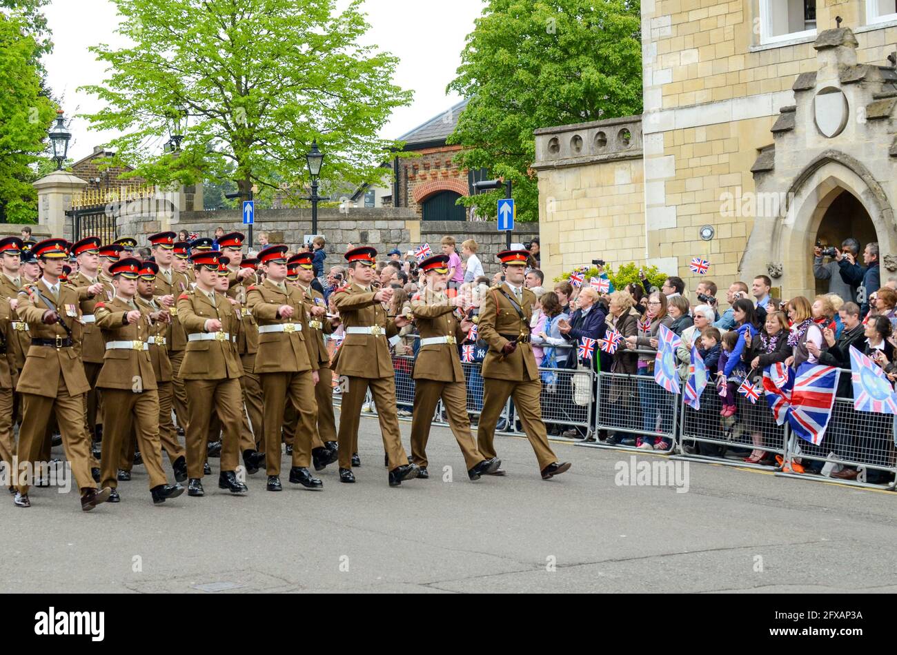 British Army soldiers marching out of Windsor Castle during ceremony ...
