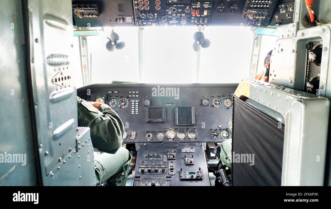 Rear view inside airplane cockpit Stock Photo - Alamy