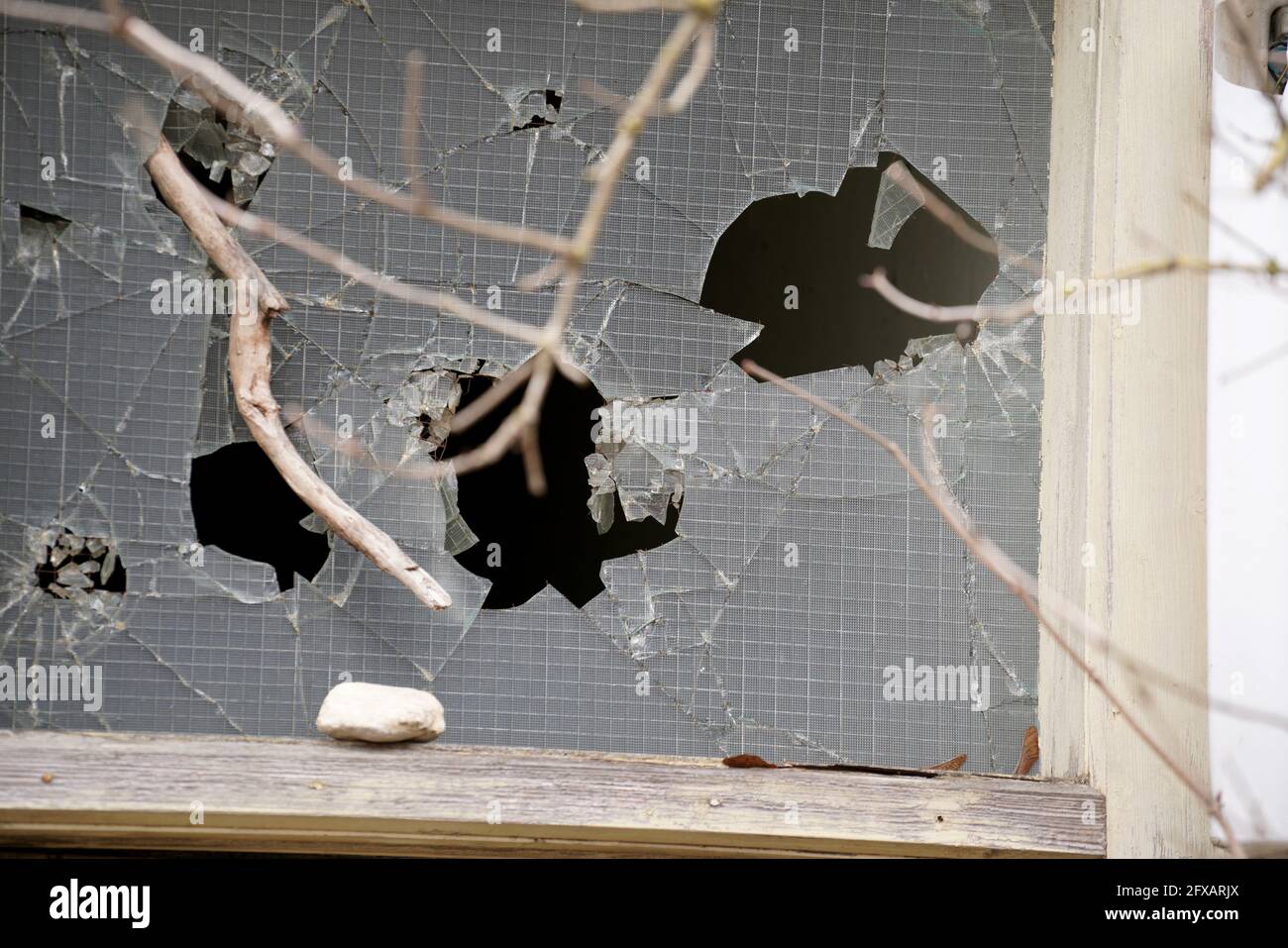 Broken, smashed window glass on an uninhabited building in Bavaria ...