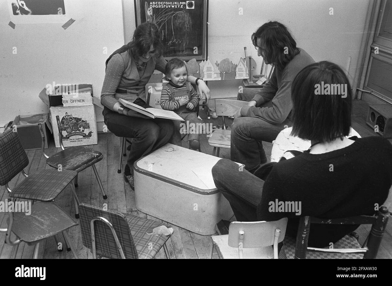 Children squatting Black and White Stock Photos & Images - Alamy