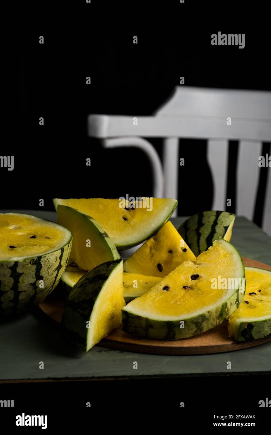 Yellow watermelon cut and serve don table Stock Photo - Alamy