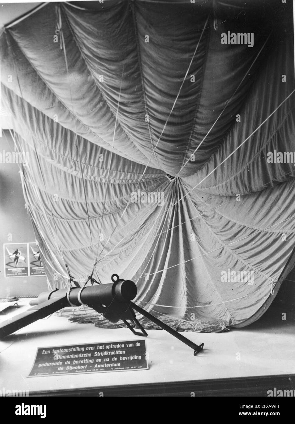 A dropped machine gun, Attached to a parachute to save it from damage ...